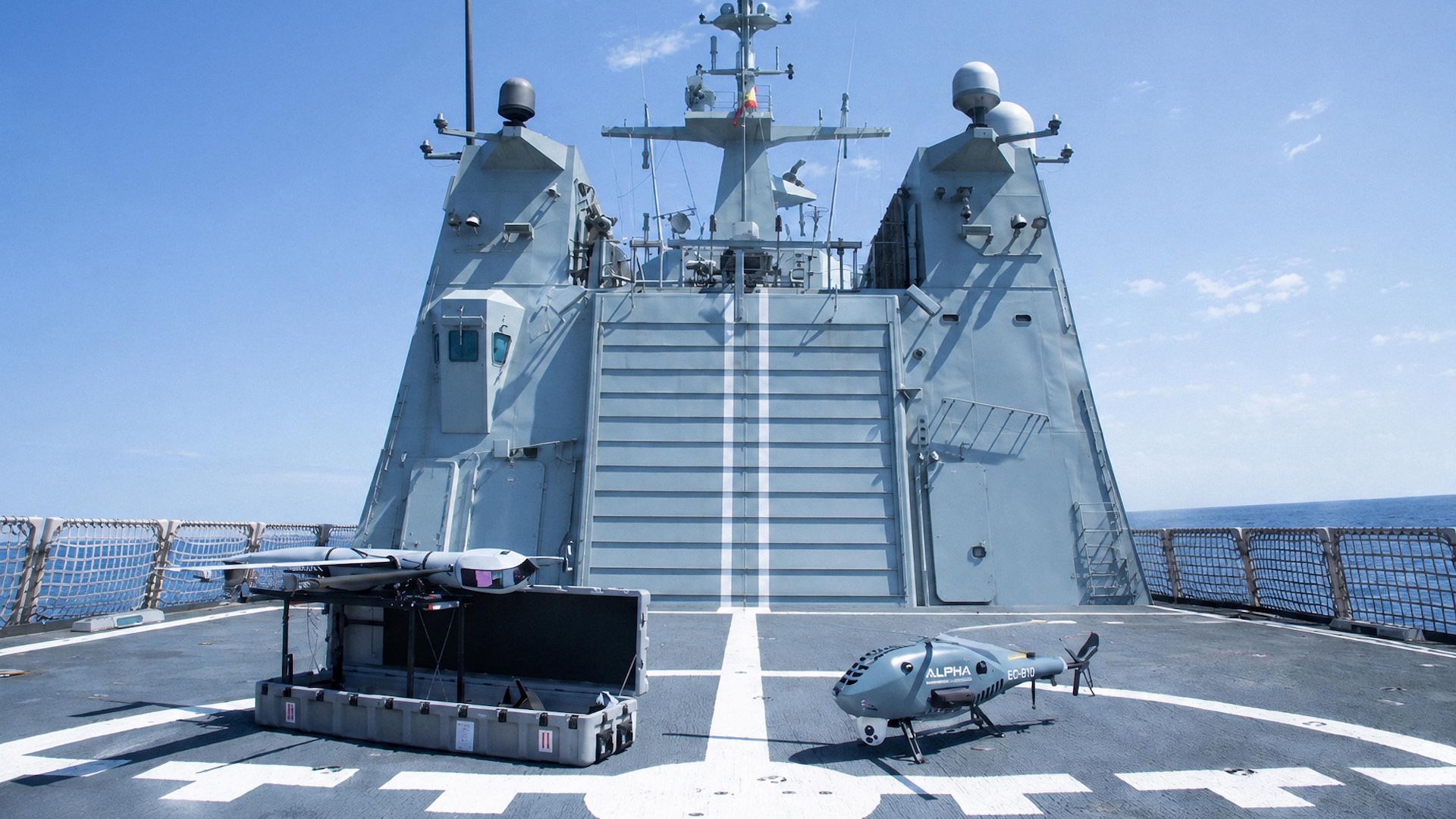 Spanish Navy tests drones controlled from helicopter in boat chase drill