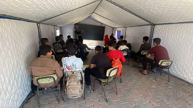 Gaza students sit exams in tents as nearly all schools lie in ruins