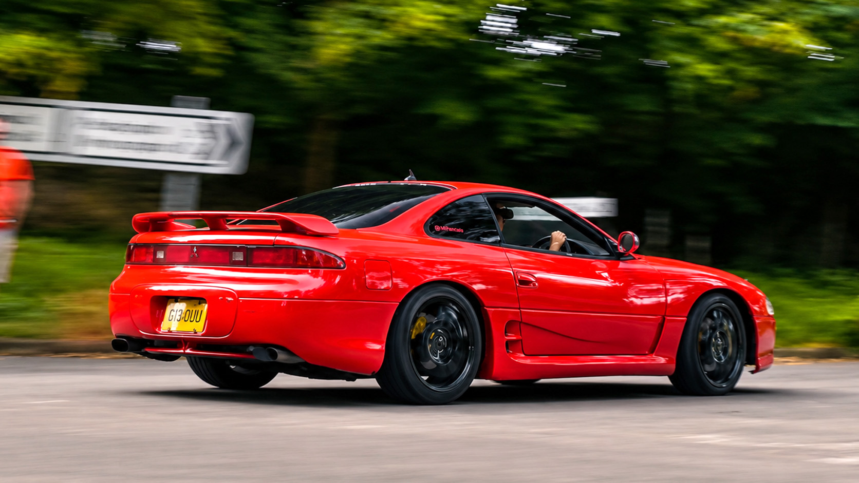 Modified car leaves the car meet with hard acceleration