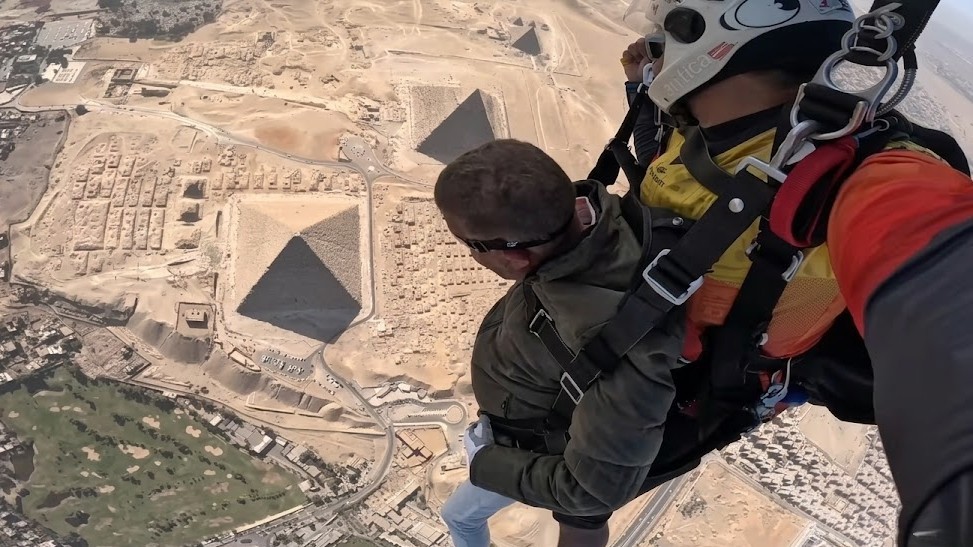 He opened a helicopter door 10,000 feet above Egypt’s pyramids - then ...
