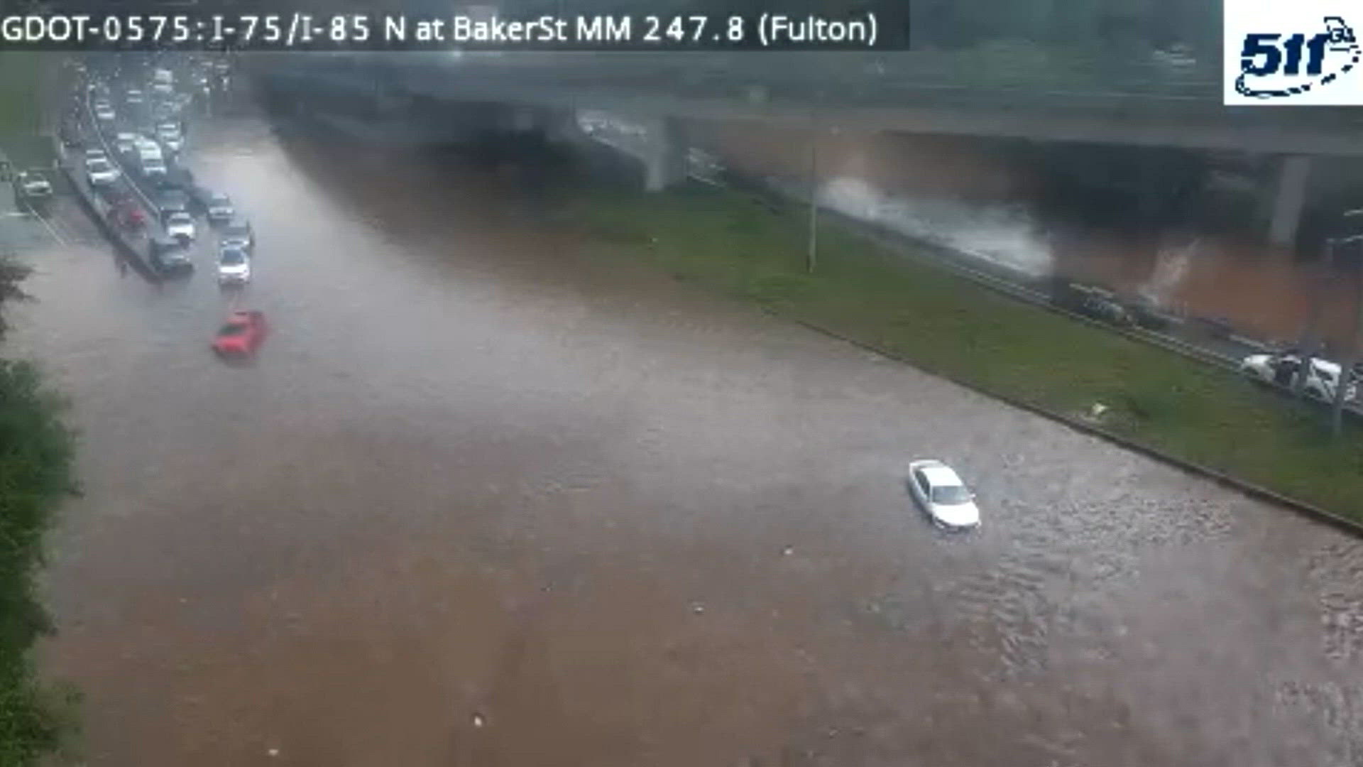 Flooded roads stop traffic in Atlanta after heavy rains fell there