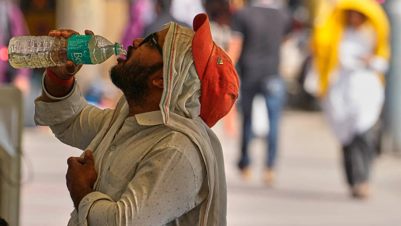 Heat wave disrupts daily life in northern India as farmers shift to ...
