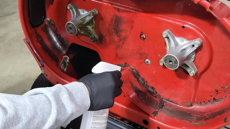 Not WD-40: There's a smarter way to keep grass off lawn mower decks for ...