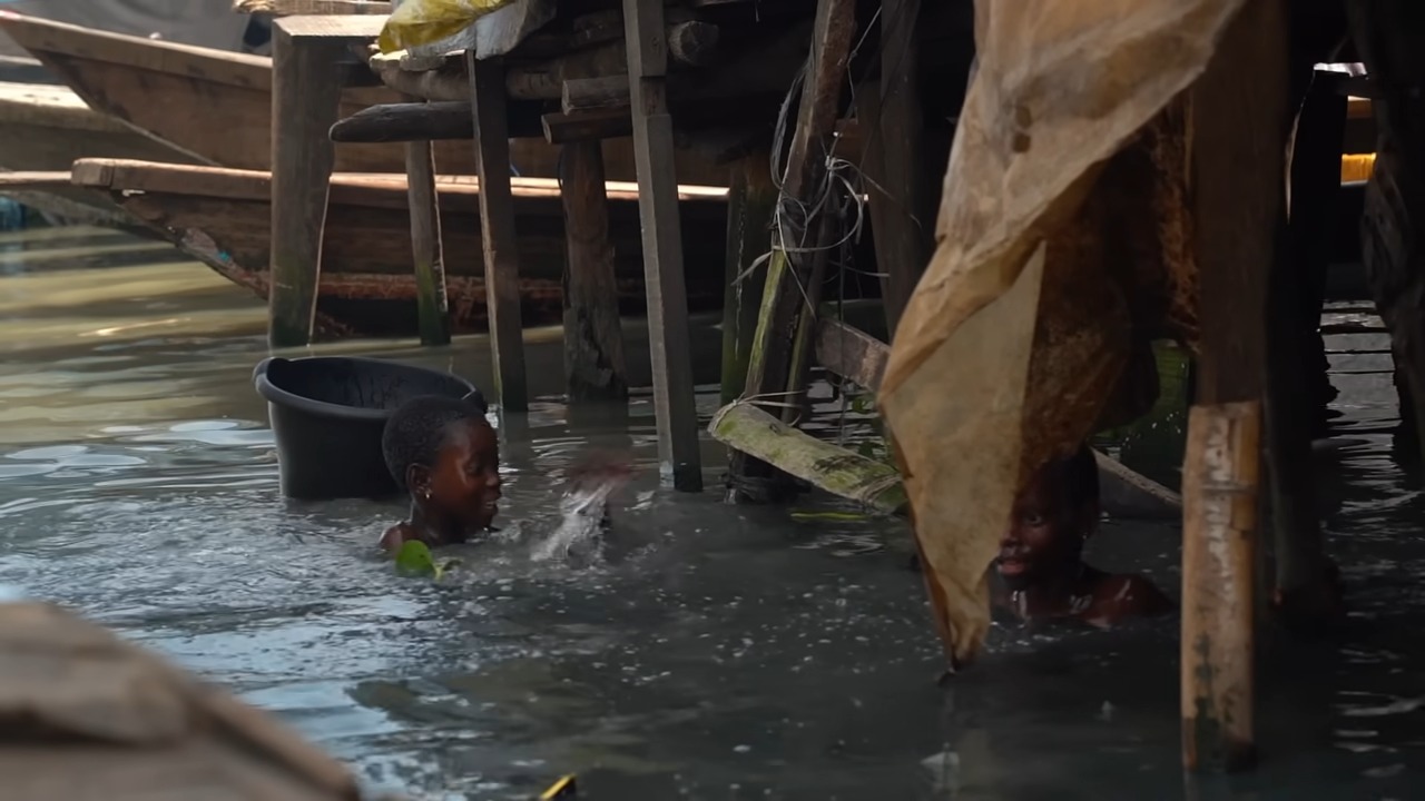 He entered Nigeria’s floating slum - then saw kids swimming in toilet ...