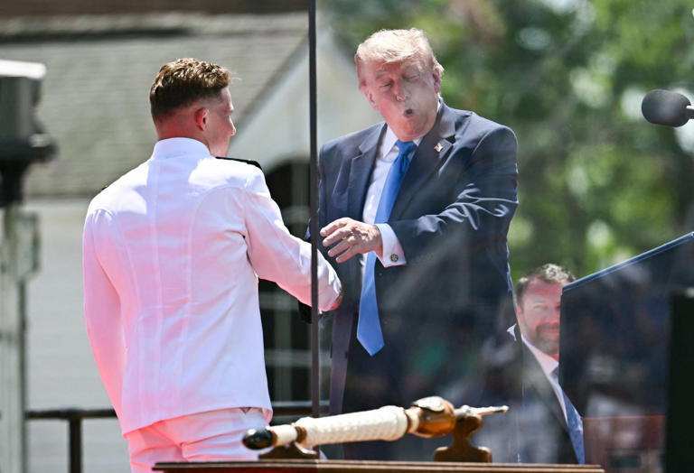 Excruciating moment Trump 'checks out' young cadets and feels their muscles