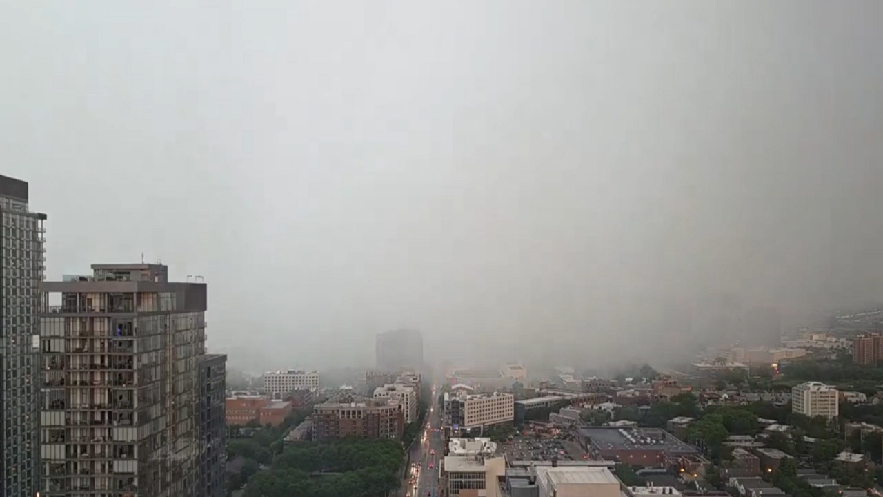 Heavy rainstorm timelapse engulfs Chicago skyline in Chicago, Illinois, USA