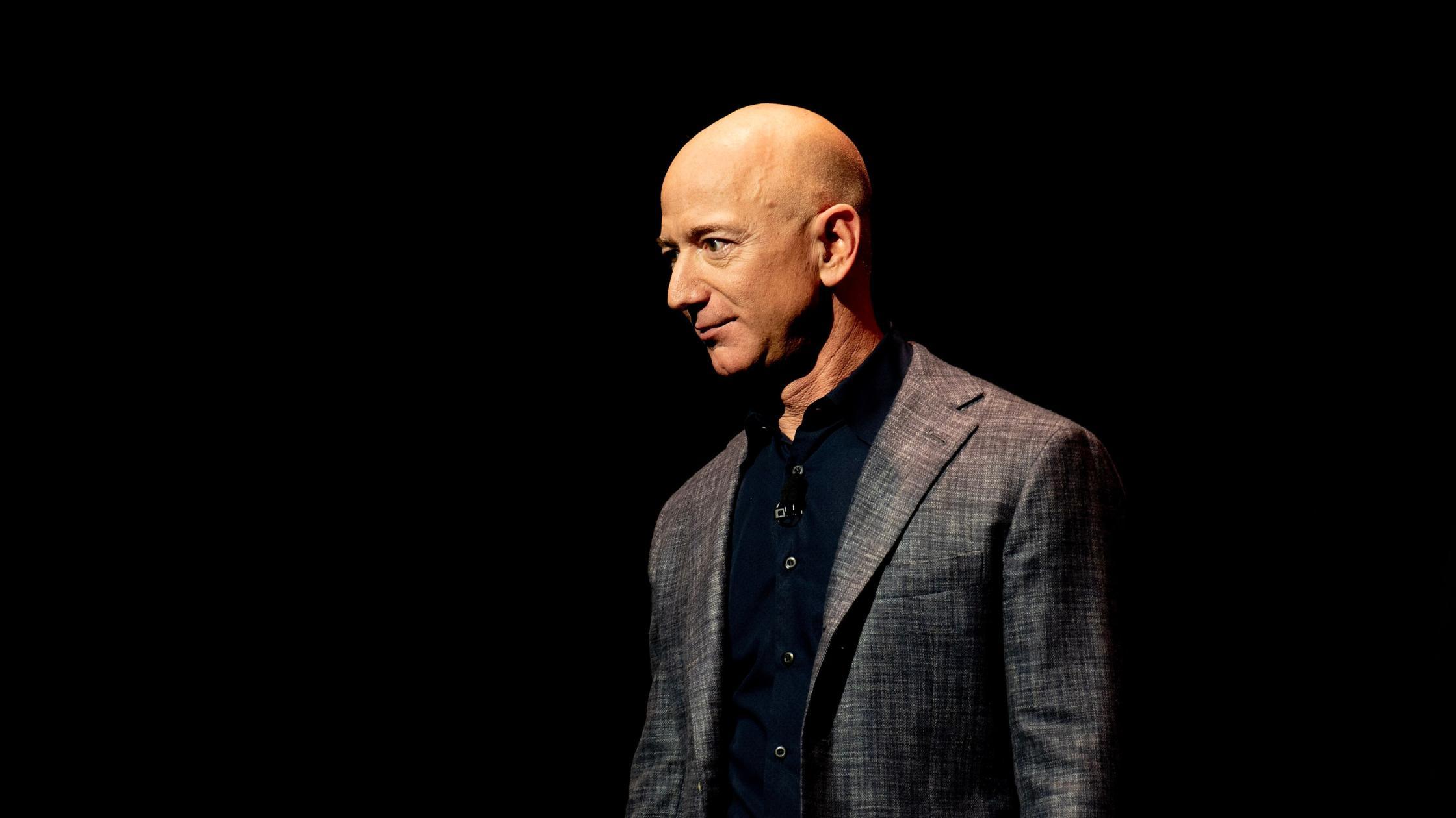 Jeff Bezos says AI will 'elevate' workers — despite Amazon's 30,000 job ...