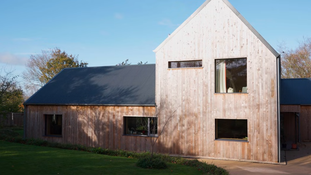 A modern countryside home with a secret slide and 40-mile views