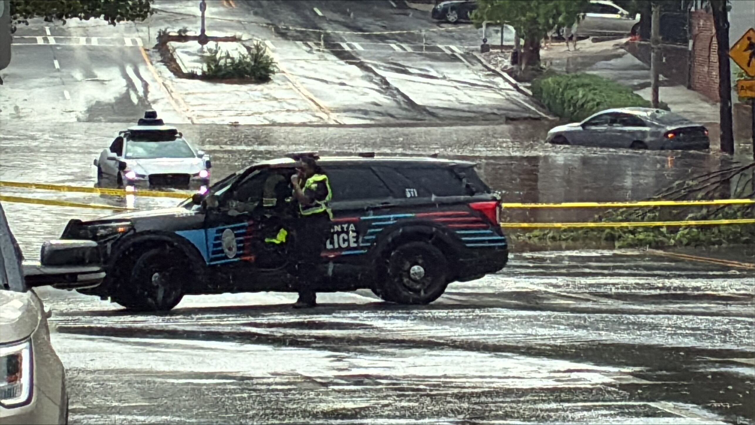 Waymo services suspended in Atlanta after vehicle gets stuck on flooded ...