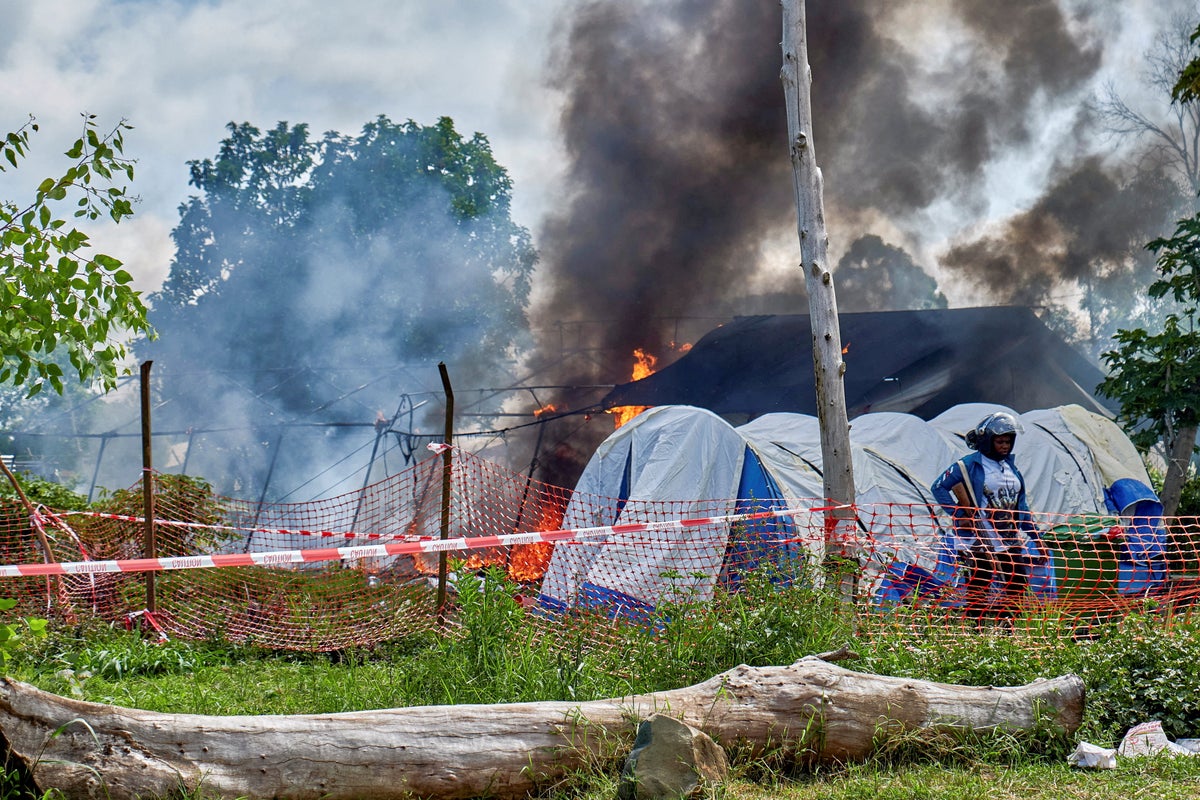 Ebola treatment centre set on fire amid anger over virus outbreak