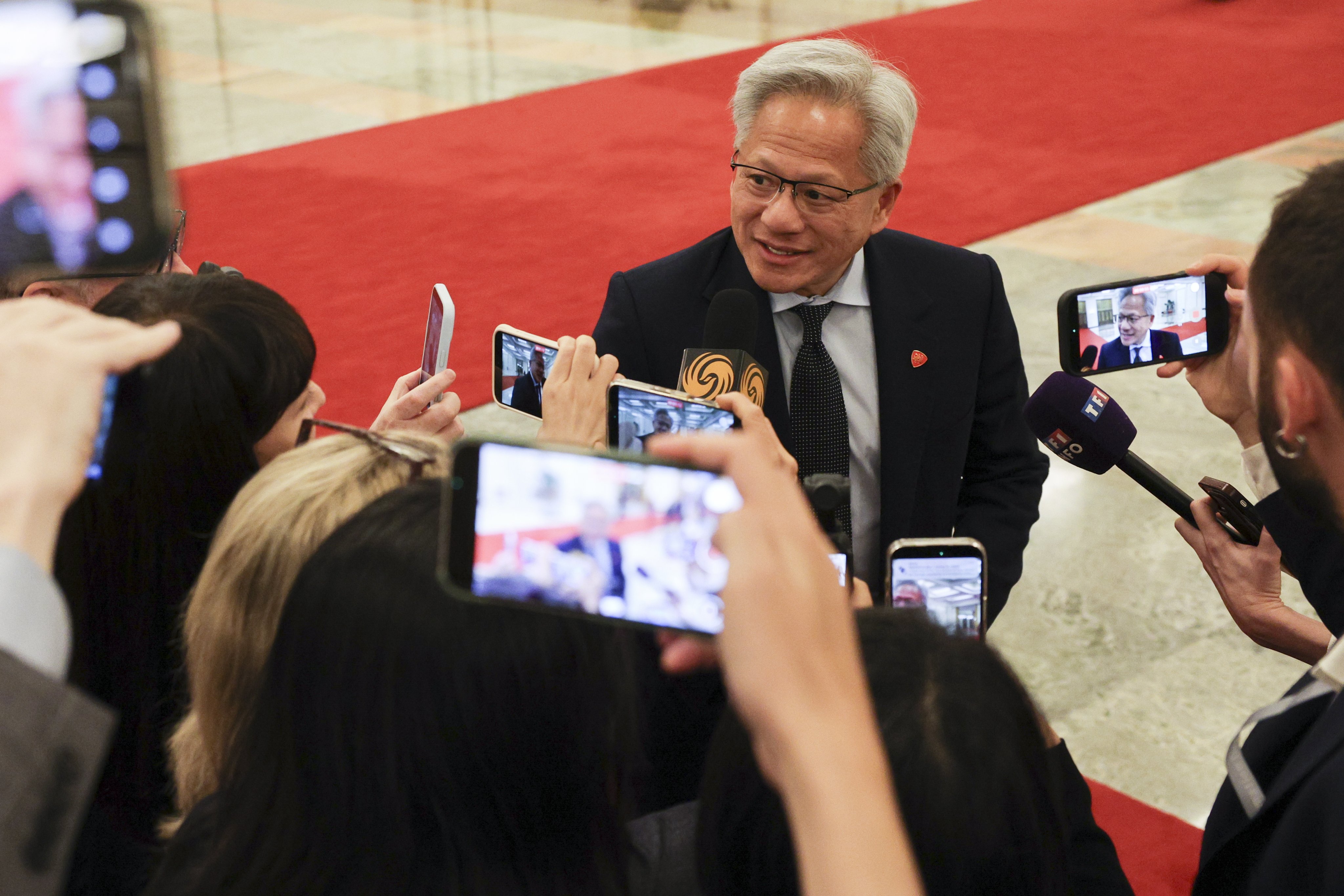 Nvidia’s H200 sales prospects in China remain uncertain despite Huang visit