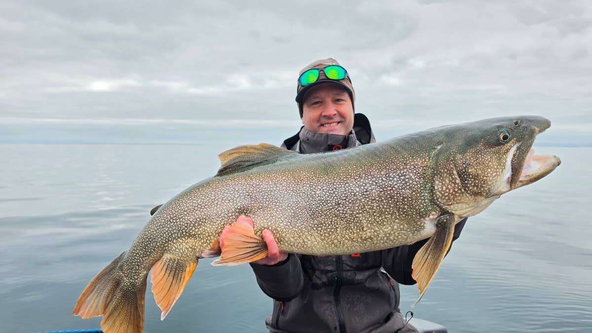Twin Cities man catches record-breaking trout on Lake Superior