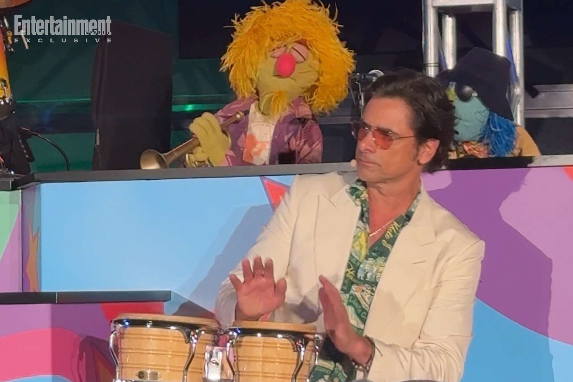 Watch John Stamos crash Muppets performance with surprise bongo set at ...