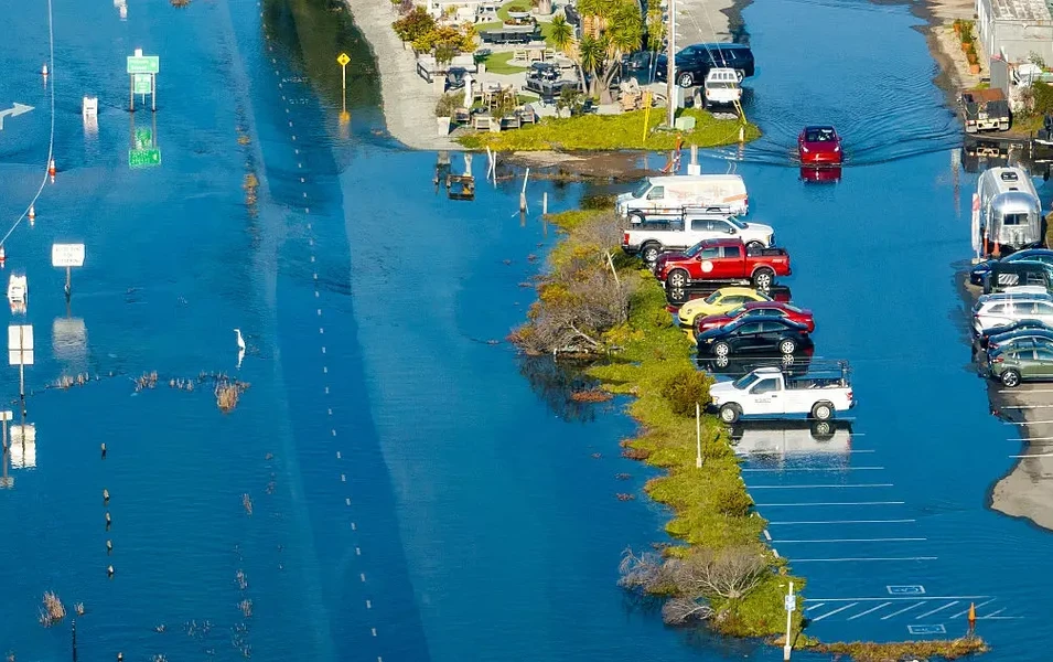 Study warns sinking cities face triple sea level risk