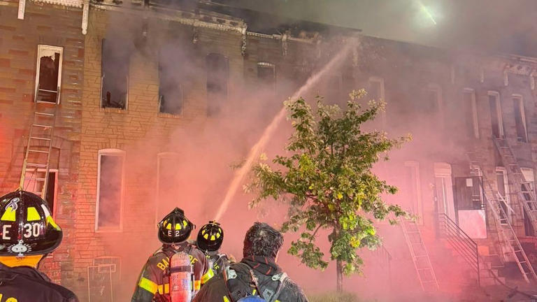 Late-night fire damages multiple rowhomes in southwest Baltimore