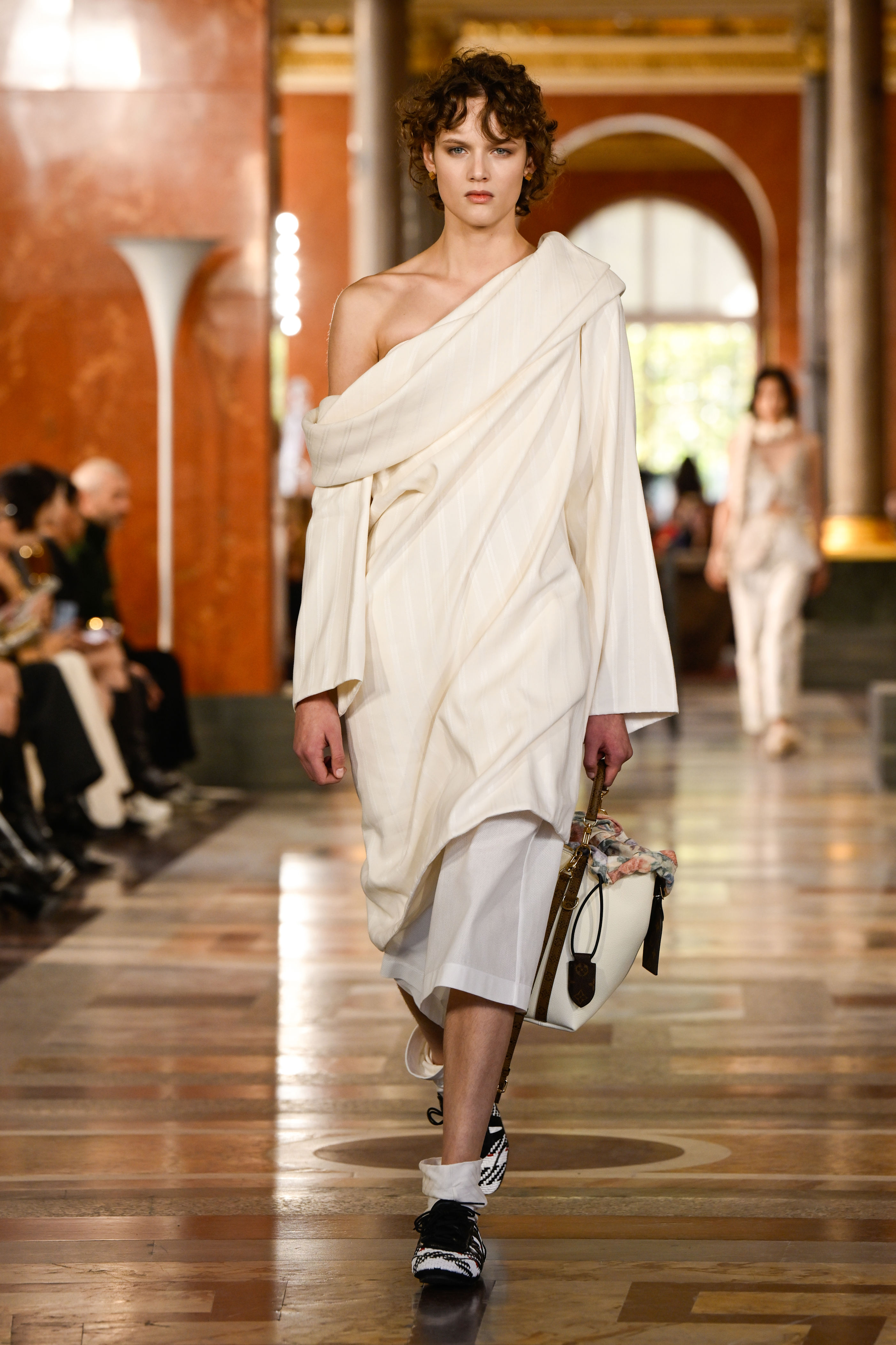 Zendaya trades her Louis Vuitton dress for a minutes-old runway look