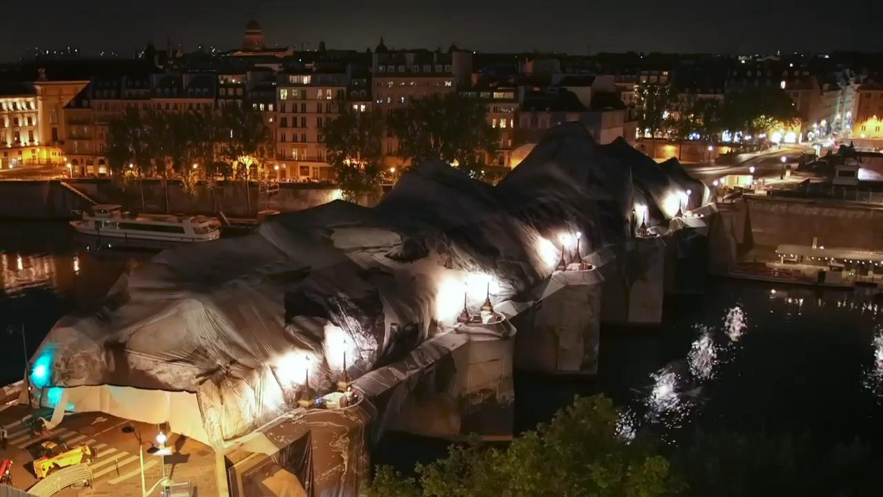French artist JR inflates a giant 'cave' over Paris' oldest bridge