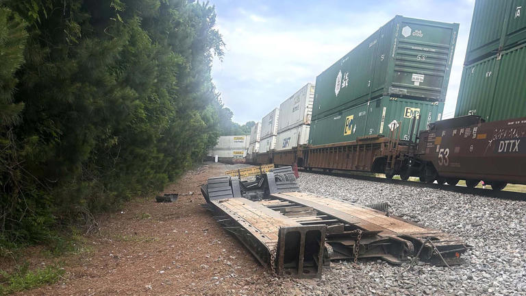 Train crashes into truck, derails in Hall County, sheriff says