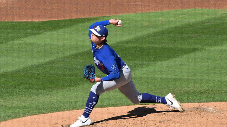 Why aren't Dodgers calling up top pitching prospect amid rash of injuries?