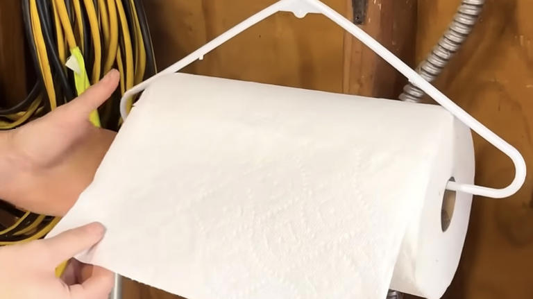 The easiest DIY paper towel holder is sitting in your closet right now