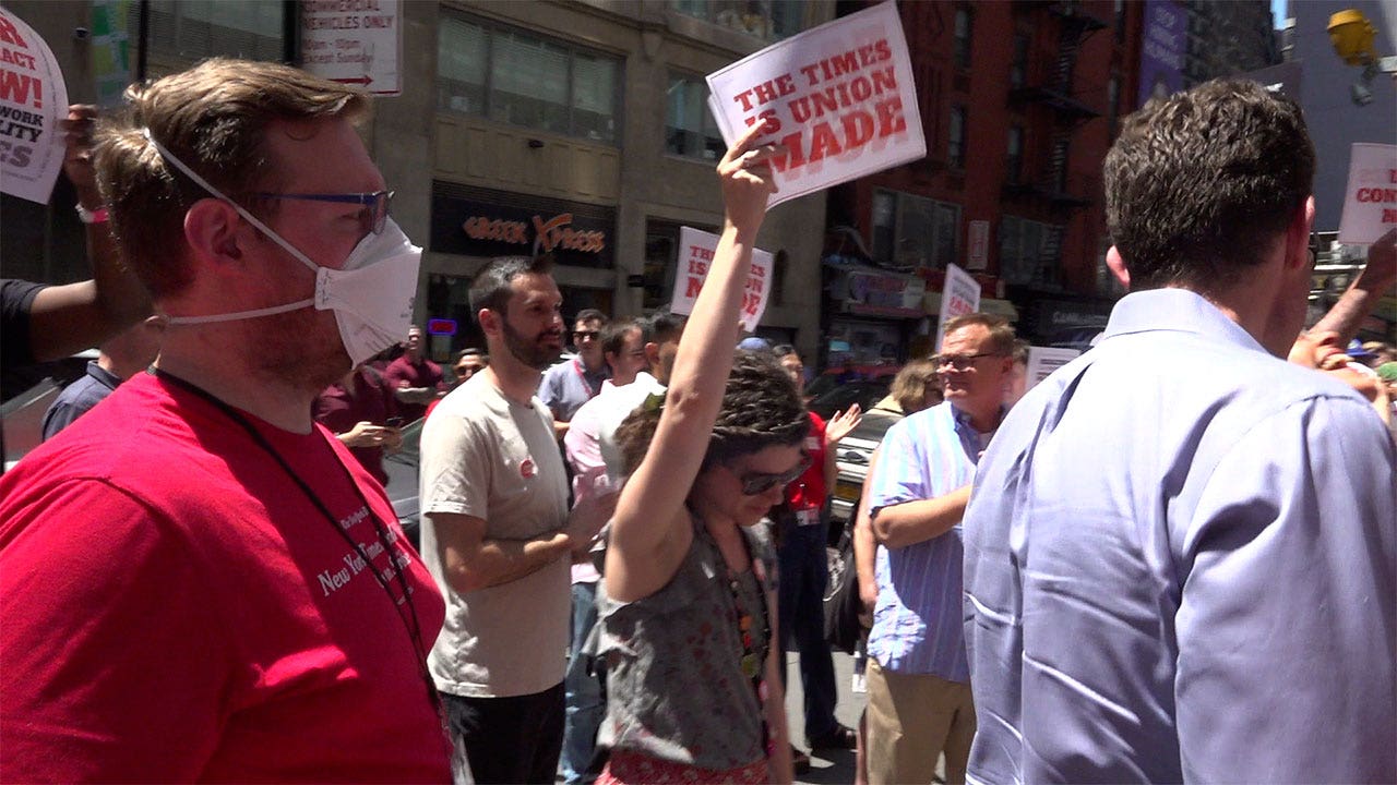 New York Times staffers rally outside headquarters demanding fair ...