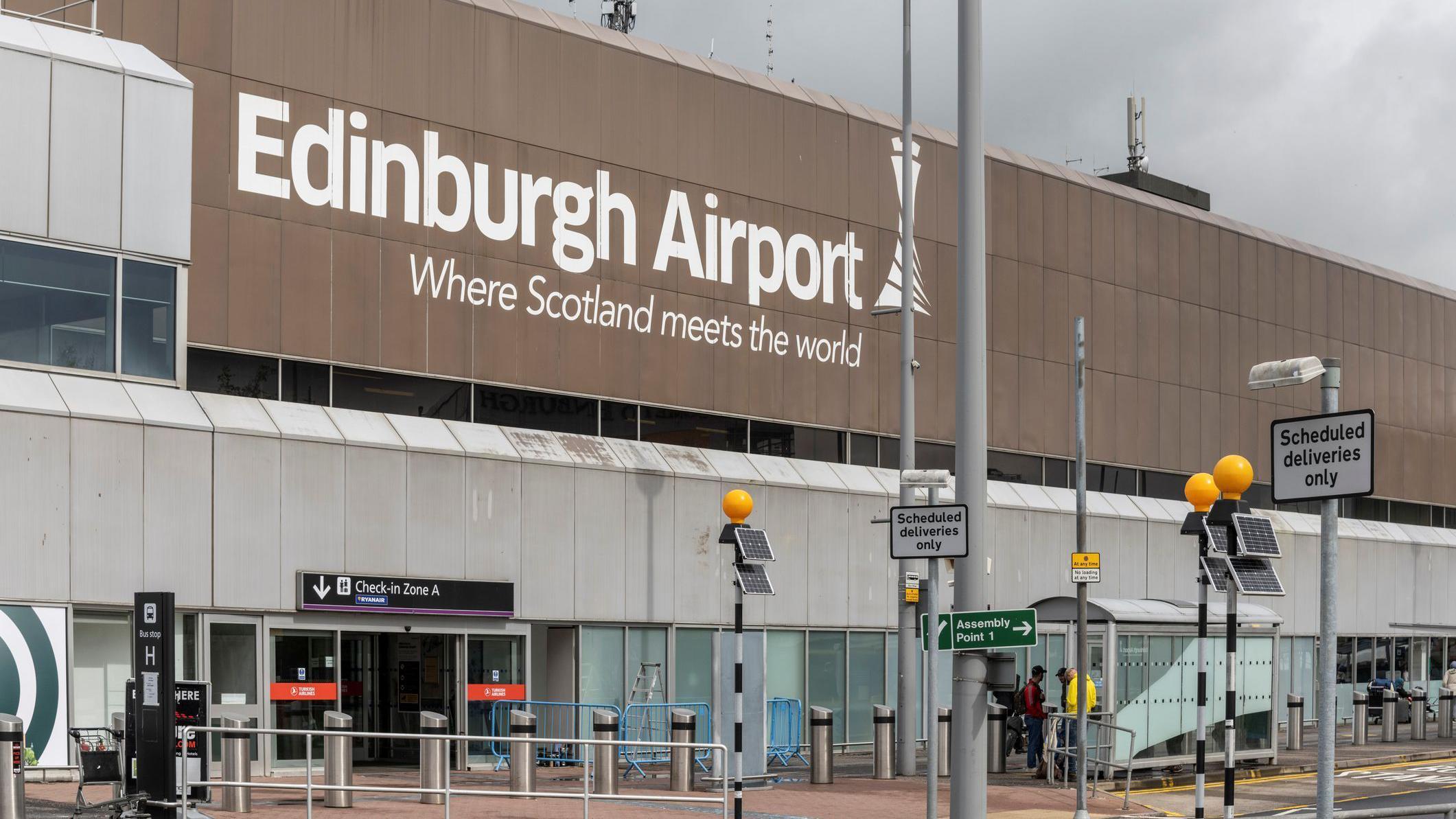 Hundreds of Scottish airport staff vote for summer strike action