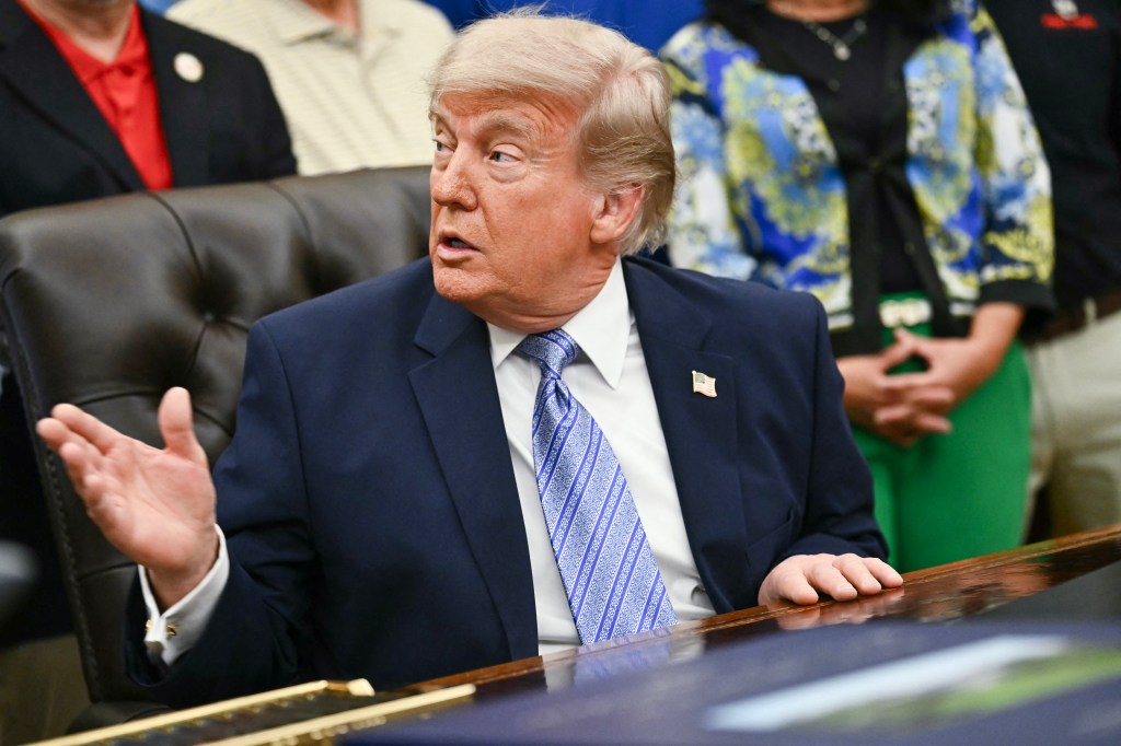 Trump says he postponed signing AI order because he didn’t like it