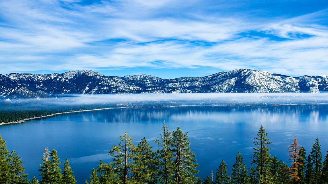 Beautiful panorama of calm lake and mountain range