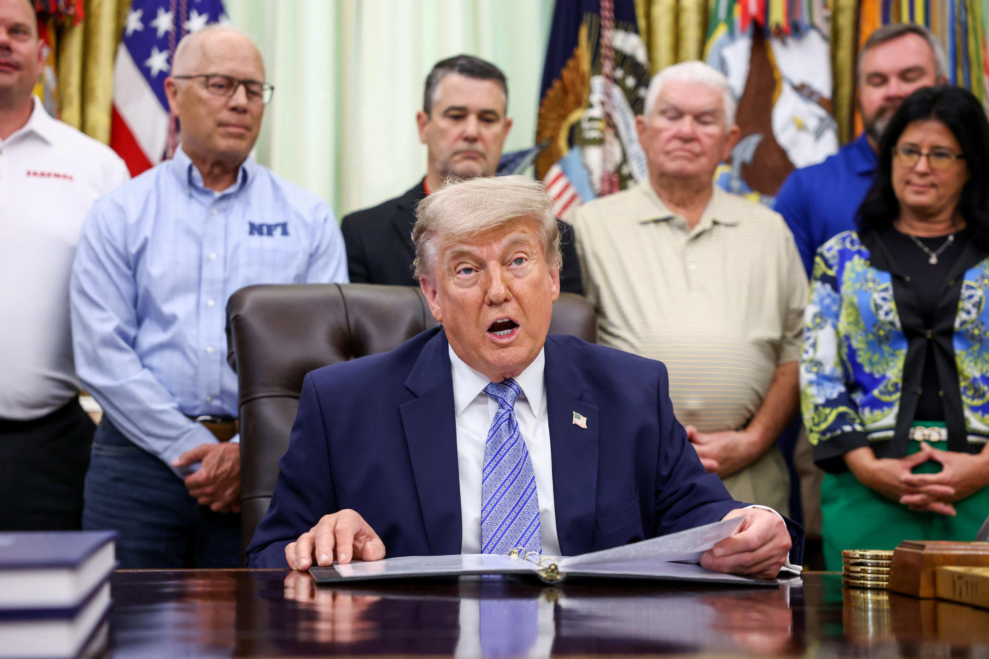 Trump rolls back Biden-era refrigerant rules in push to lower grocery costs