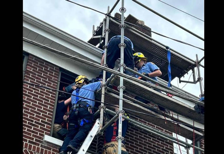 Man rescued from scaffolding after hitting power lines