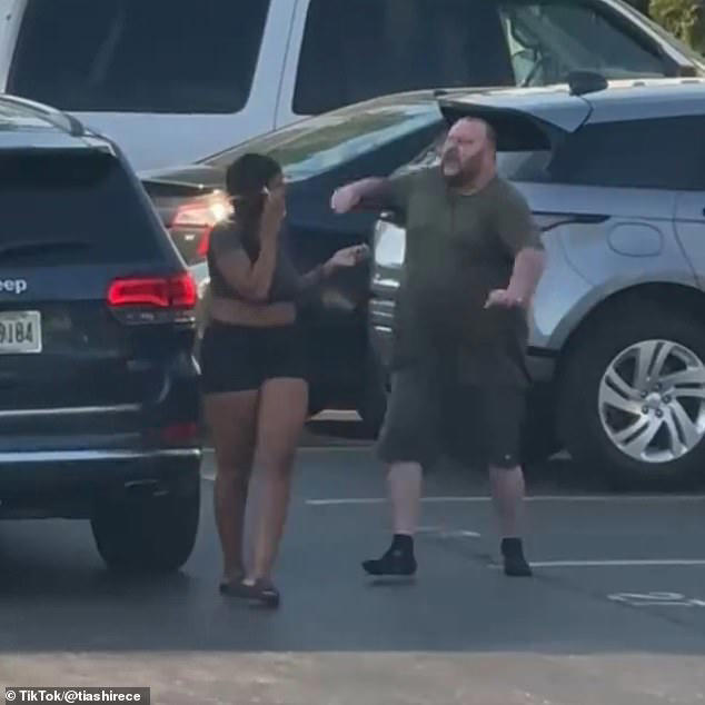 White man charged after he was filmed screaming at black woman and ...