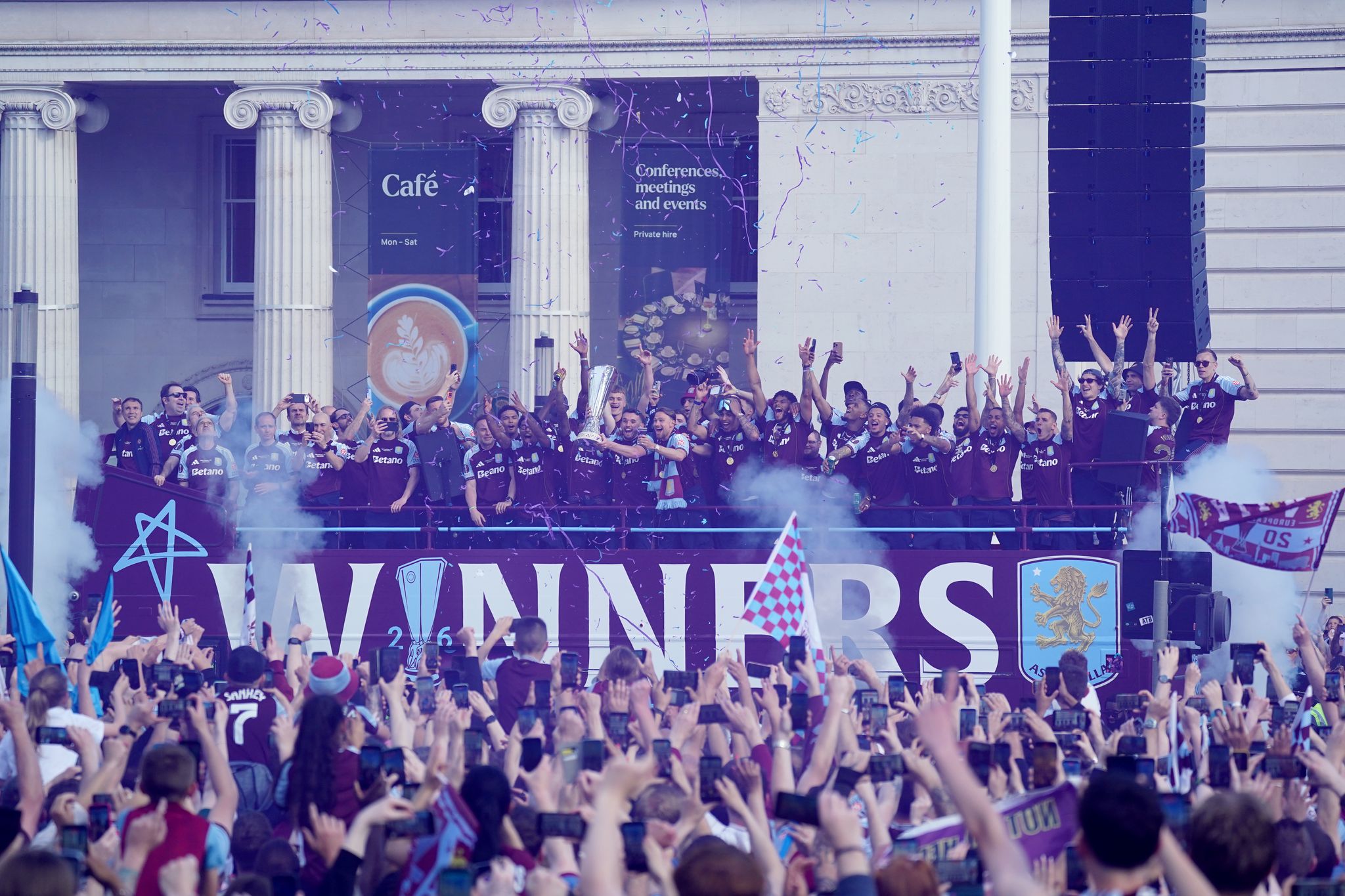 Fans line streets to greet Aston Villa after Europa League success