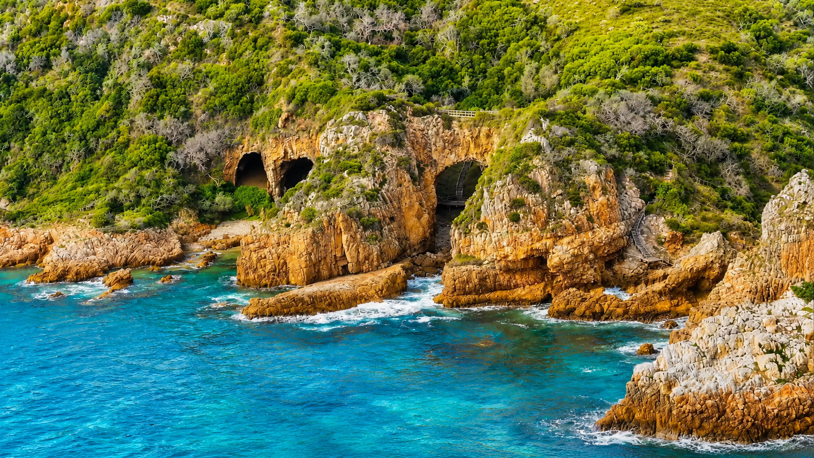 Towering coastal cliffs guarding the entrance to Knysna