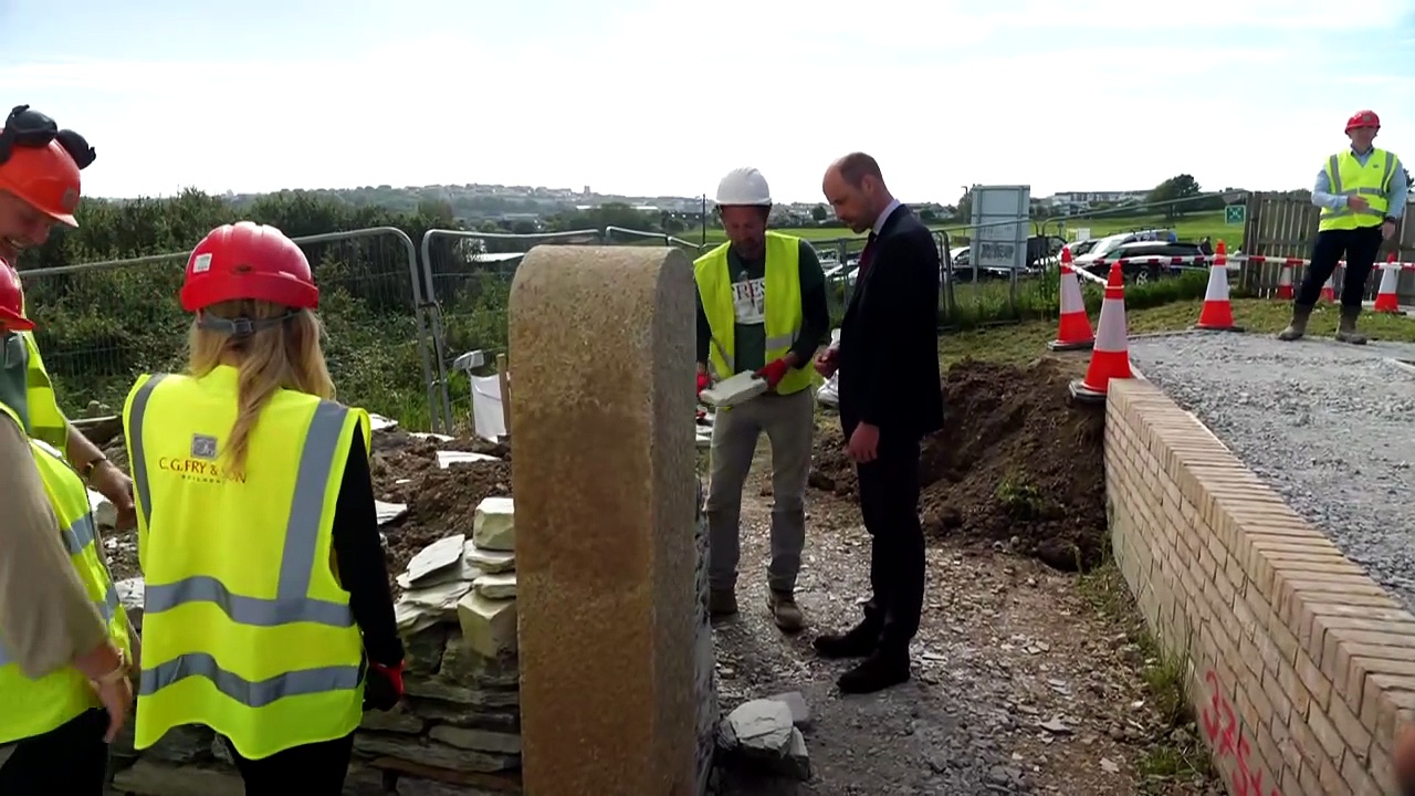 Prince William tries hand at bricklaying