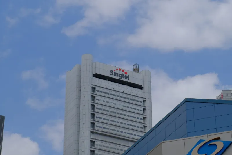 Singtel weighs minority Optus stake sale as H2 net profit drops 21%