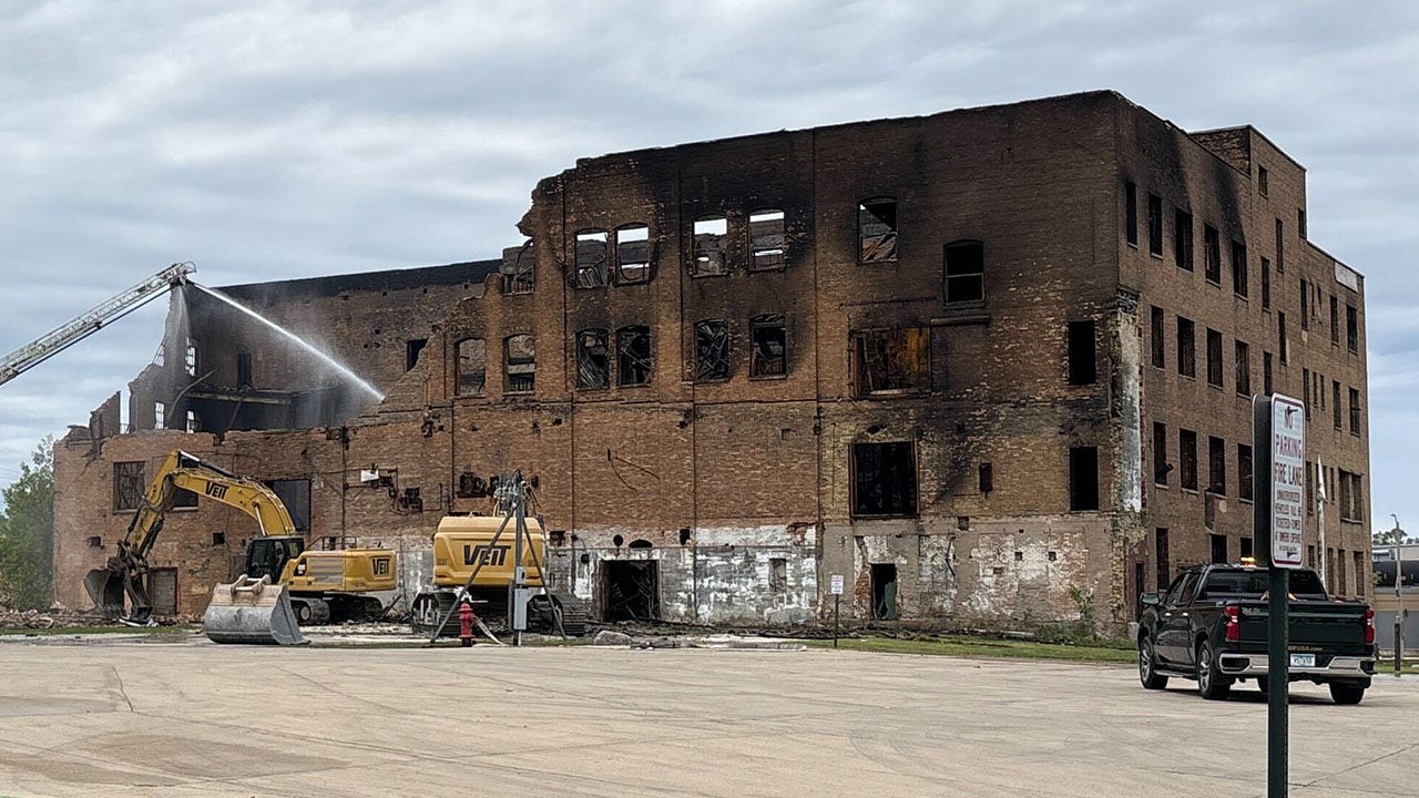 Milwaukee fire: Police arrest woman, building at risk of collapse