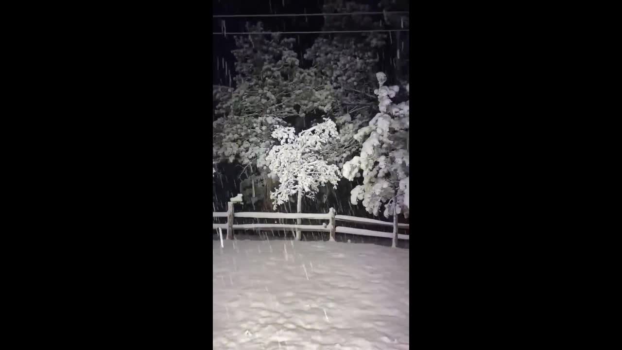 Heavy snowfall blankets Woodland Park during rare late-season storm in ...