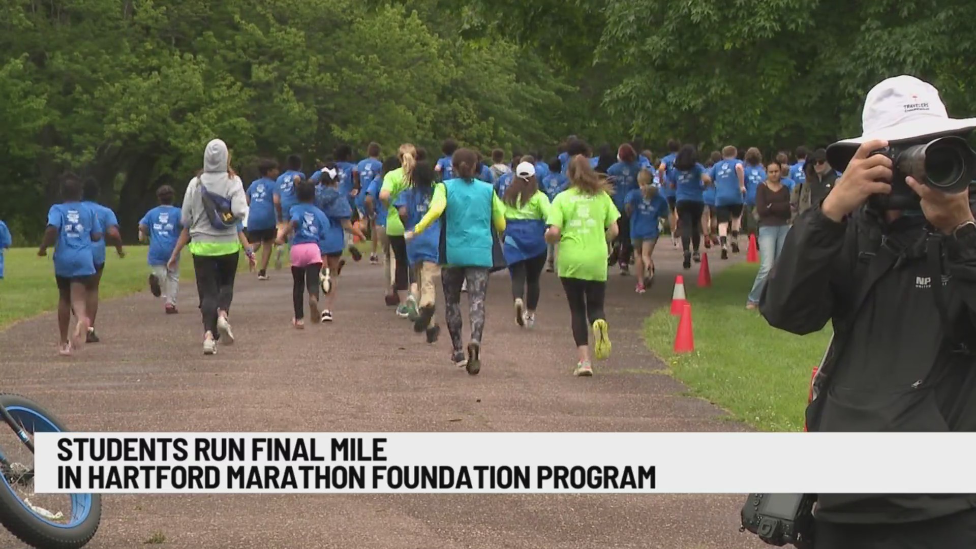 Connecticut students crossing finish line of youth running program
