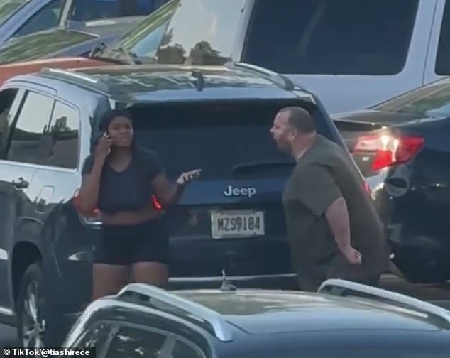 White man charged after he was filmed screaming at black woman and ...