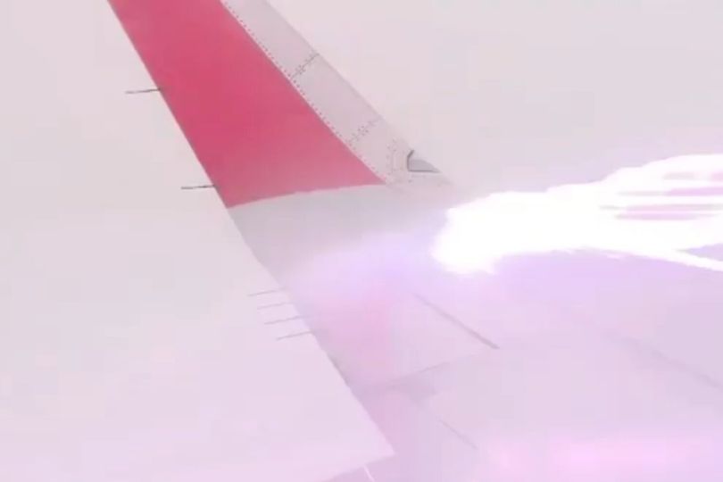 Terrifying moment lightning blasts plane wing mid-flight leaving ...