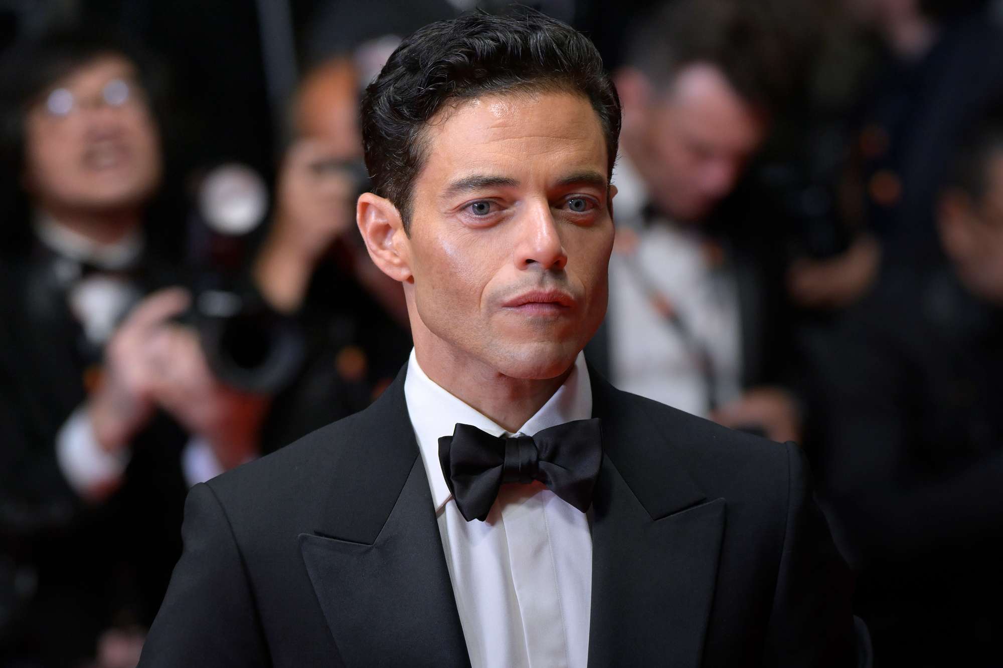 Rami Malek tears up as his AIDS drama receives 9-minute standing ...