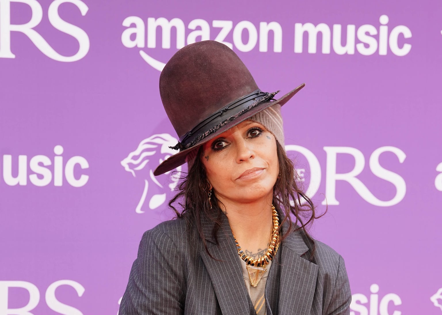 Linda Perry says songwriters should 'embrace' artificial intelligence