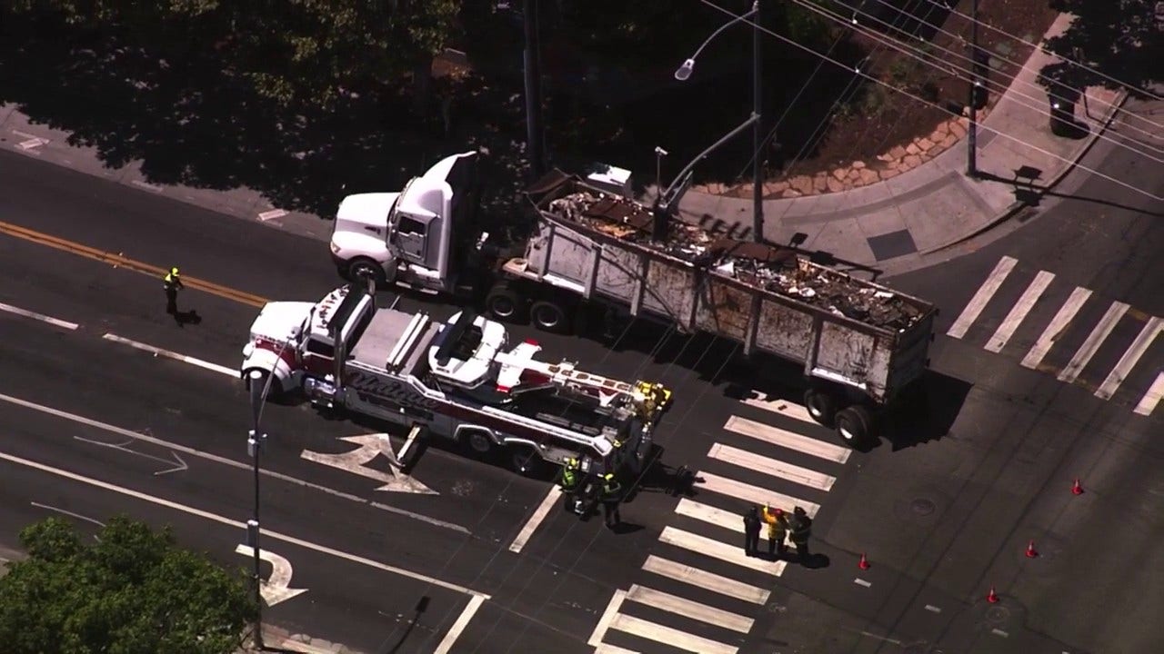 Damaged scrap metal truck shuts down traffic, causes power outage in ...