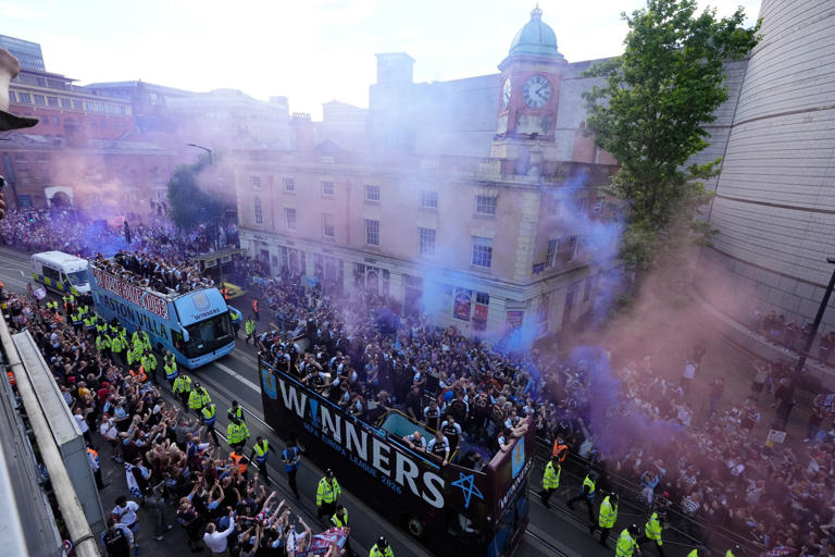 Fans line streets to greet Aston Villa after Europa League success