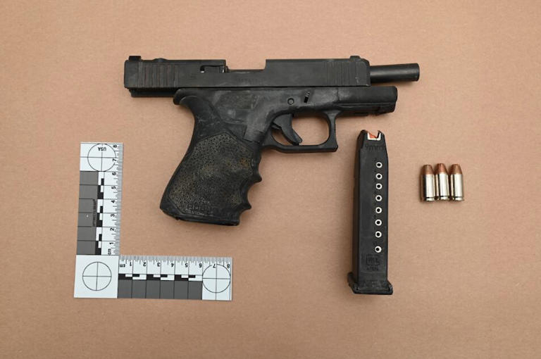 Armed robbery suspect fired at school monitors before police shooting ...