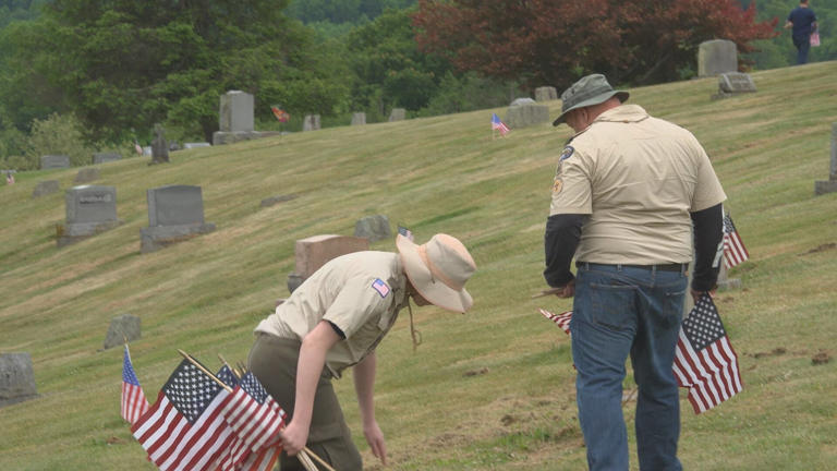 Boy Scout troop places flags on veterans’ graves for Memorial Day