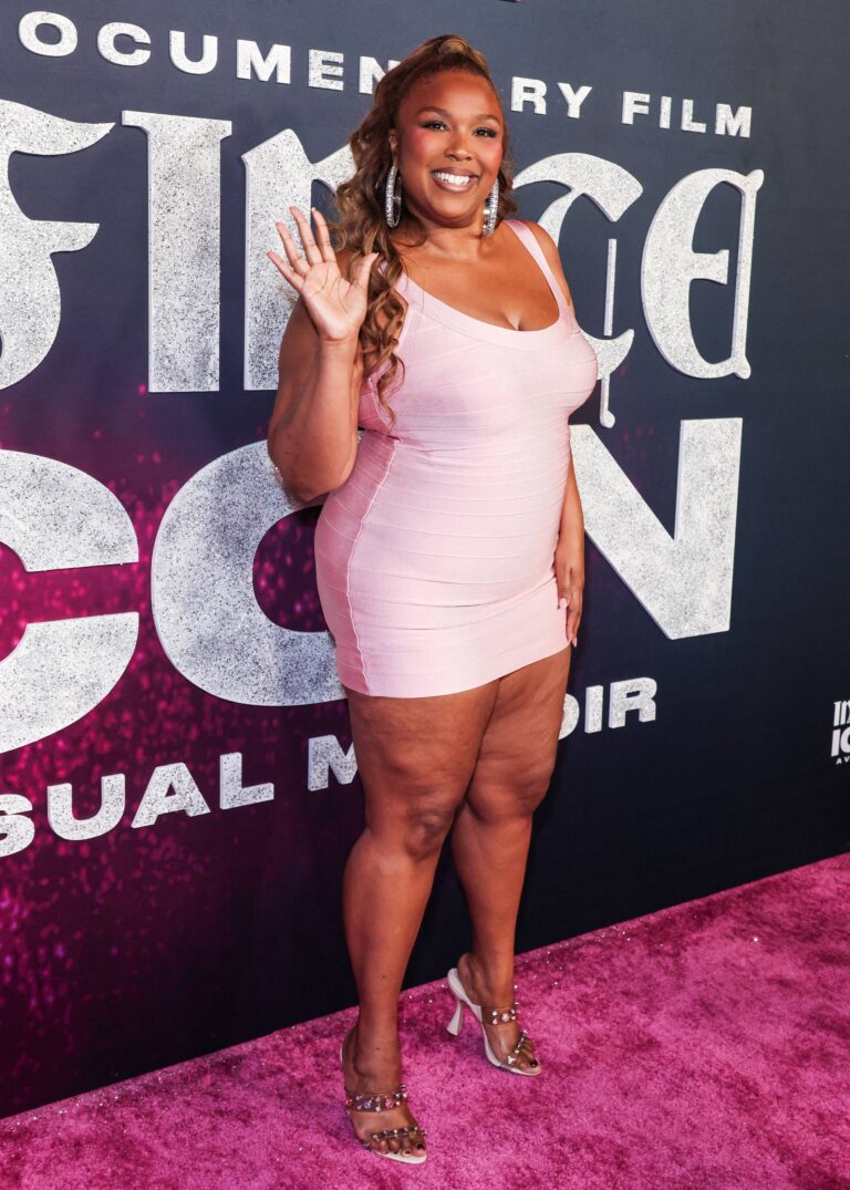 Lizzo puts her 60-pound weight loss on display in a striking blue ...