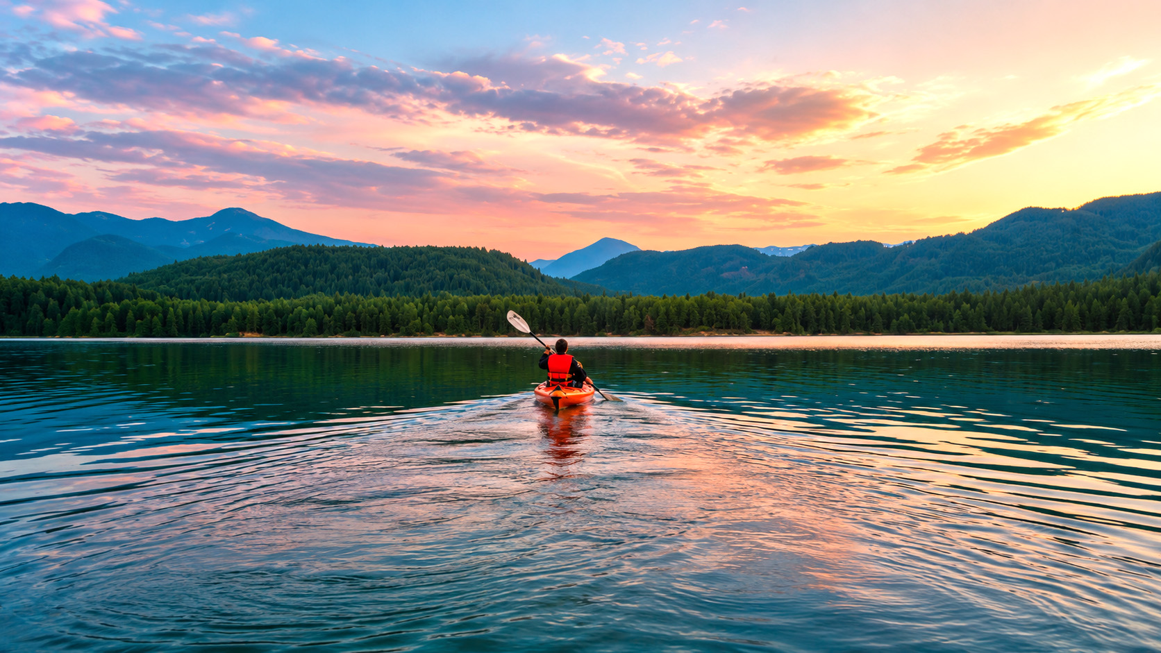 Kayaking across the crystal waters of Cultus Lake