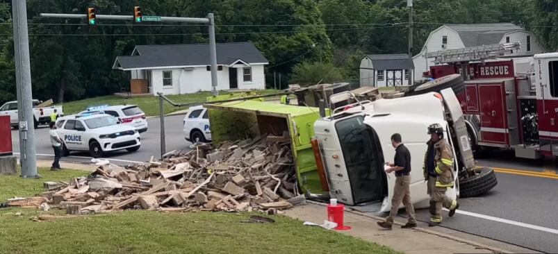 Dump truck overturns on Middle Tennessee road, spewing concrete