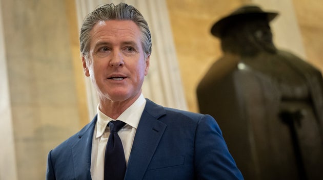 Newsom signs order protecting workers displaced by AI after massive ...